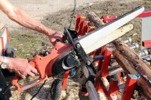 How to Hold Logs While Cutting With a Chainsaw | SawsHub